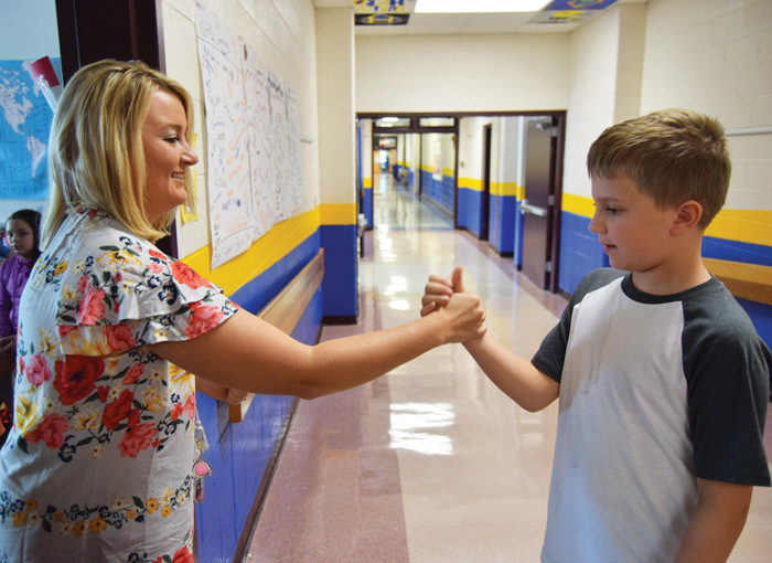 Shake on it: Teacher goes extra mile for students | Salisbury Post