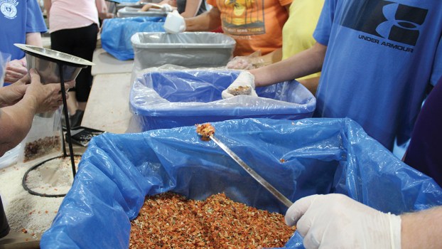 Churches come together to pack meals for Hurricane Florence victims ...