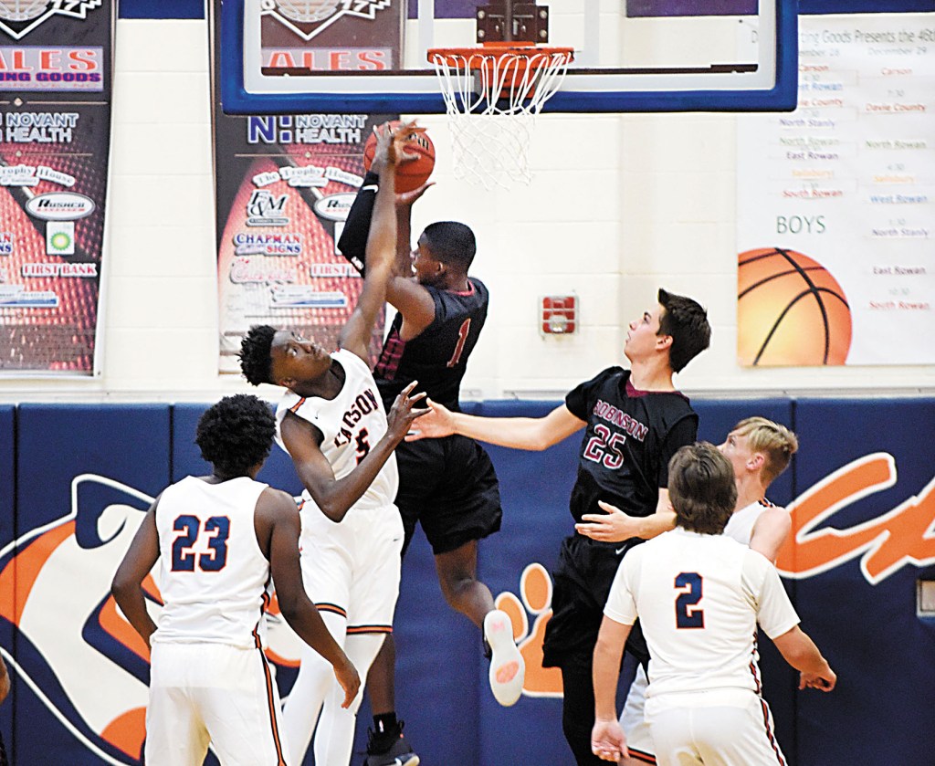 High school basketball: Inexperienced Carson boys lose opener ...
