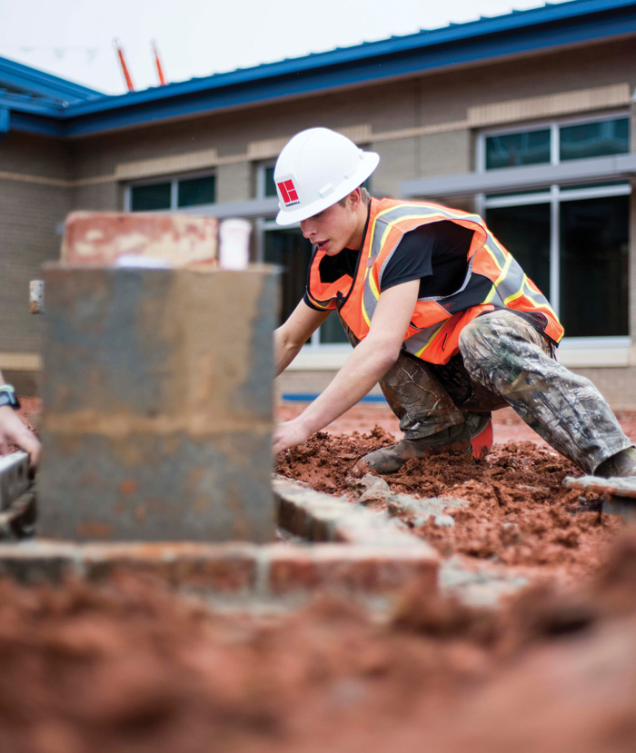 Masonry students from West Rowan High build symbolic benches for new ...