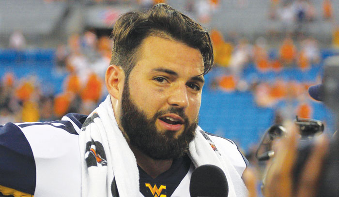 Panthers draft local QB Will Grier to back up Newton | Salisbury Post