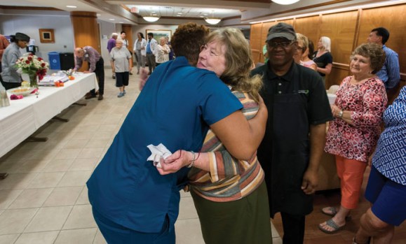 Strength, wisdom, love: Hospital auxiliary honors gift shop manager ...