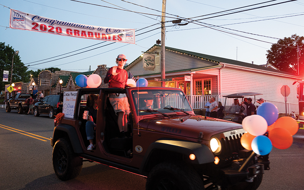 Graduating seniors ride through Faith in COVID-19-style parade ...