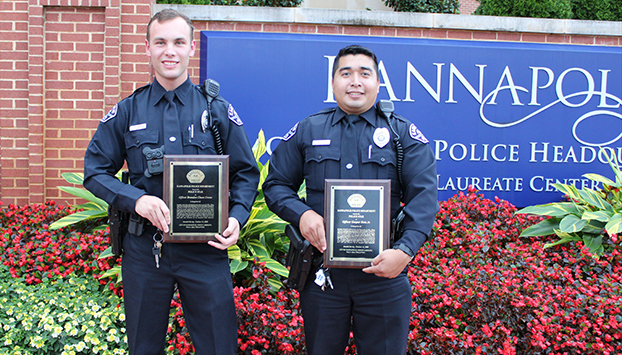 Two Kannapolis police officers honored for grabbing man off of bridge ...