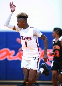 High school basketball: Carson boys improve in loss to Greyhounds ...