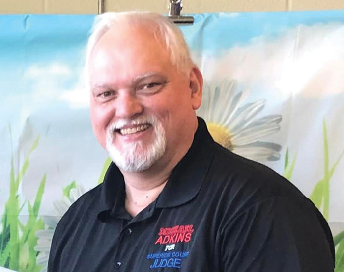 Adkins hopes to apply decades of legal experience to the bench in bid ...
