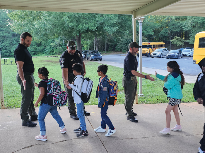Spencer police welcome students to first day of school | Salisbury Post