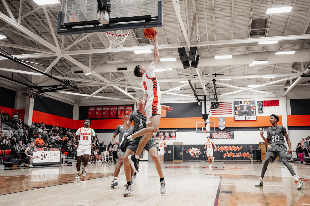 High school boys basketball: Cougars on target, pound Trojans ...