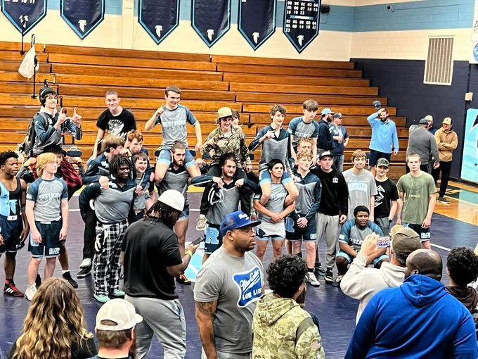 High school wrestling: Falcons advance, but Cavaliers, Raiders ...