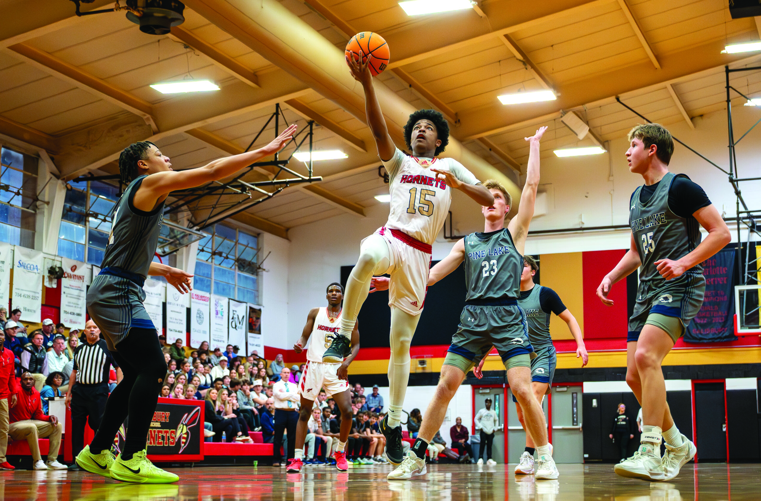 High school boys basketball: Hornets win tough 3rd-round matchup ...