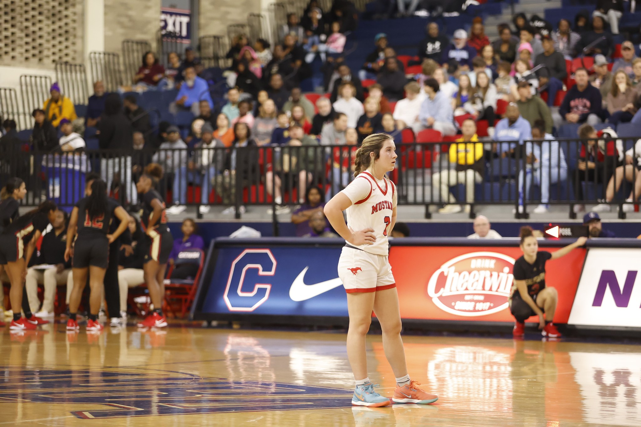 High school girls basketball: Road setback evens Mustangs’ record ...