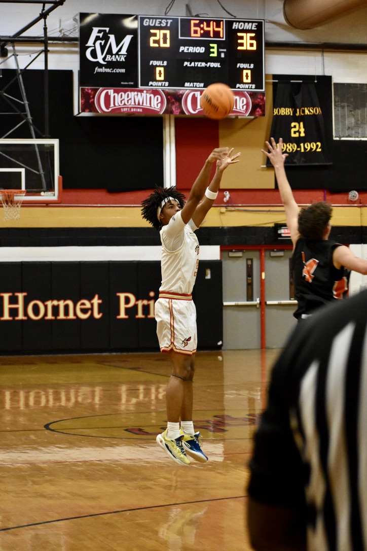 High school boys basketball: Hornets make it to another final ...