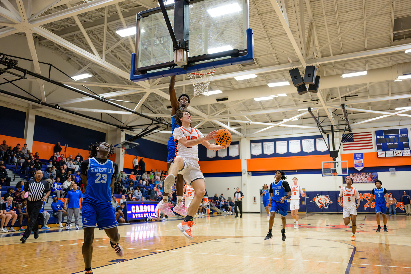 High school boys basketball: Cougars advance to Tuesday’s title game ...